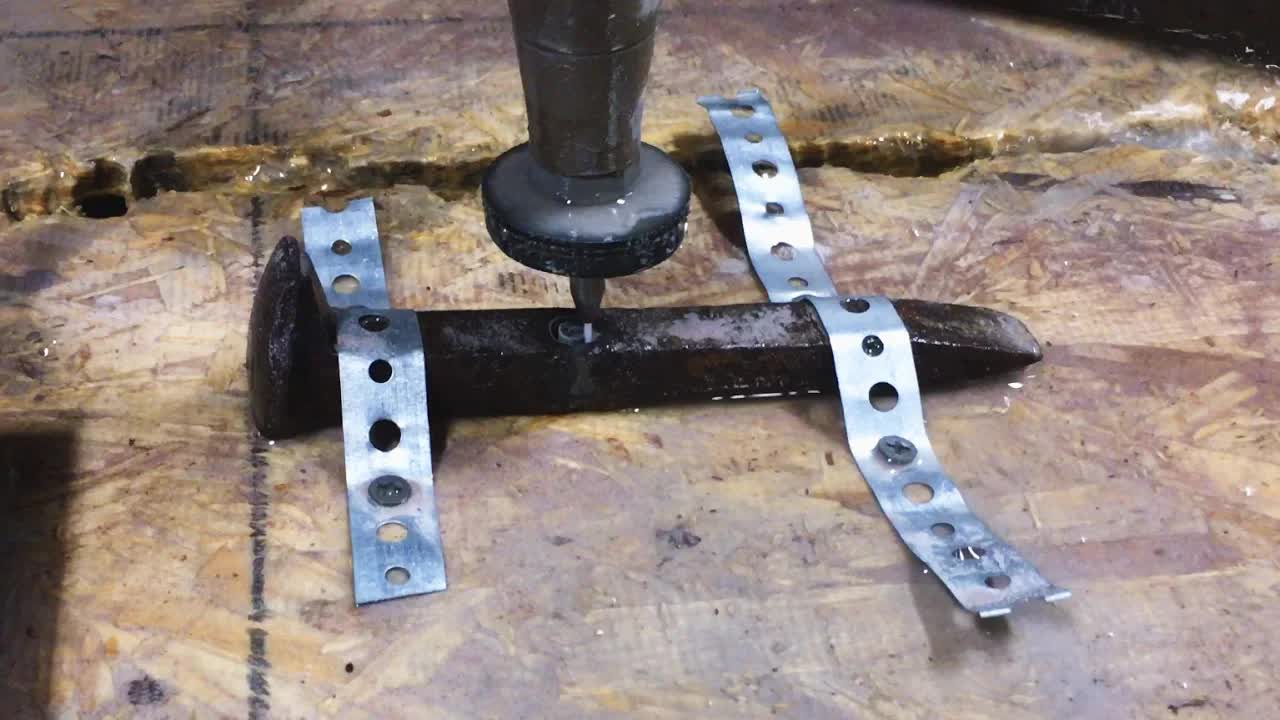 Waterjet Cutting Railroad Spike with Fan Mai... | Open Video